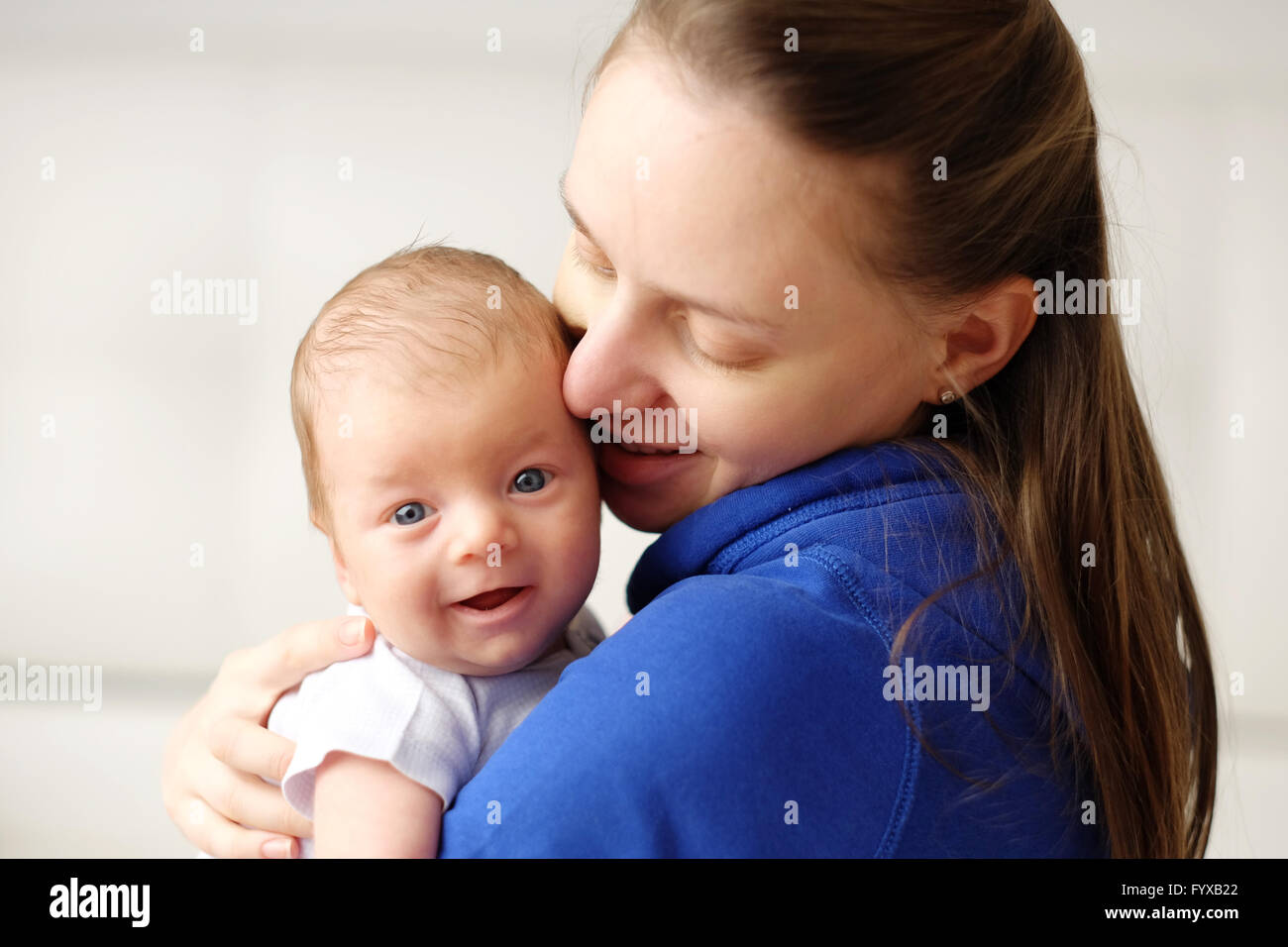 One month old newborn baby with mother Stock Photo - Alamy