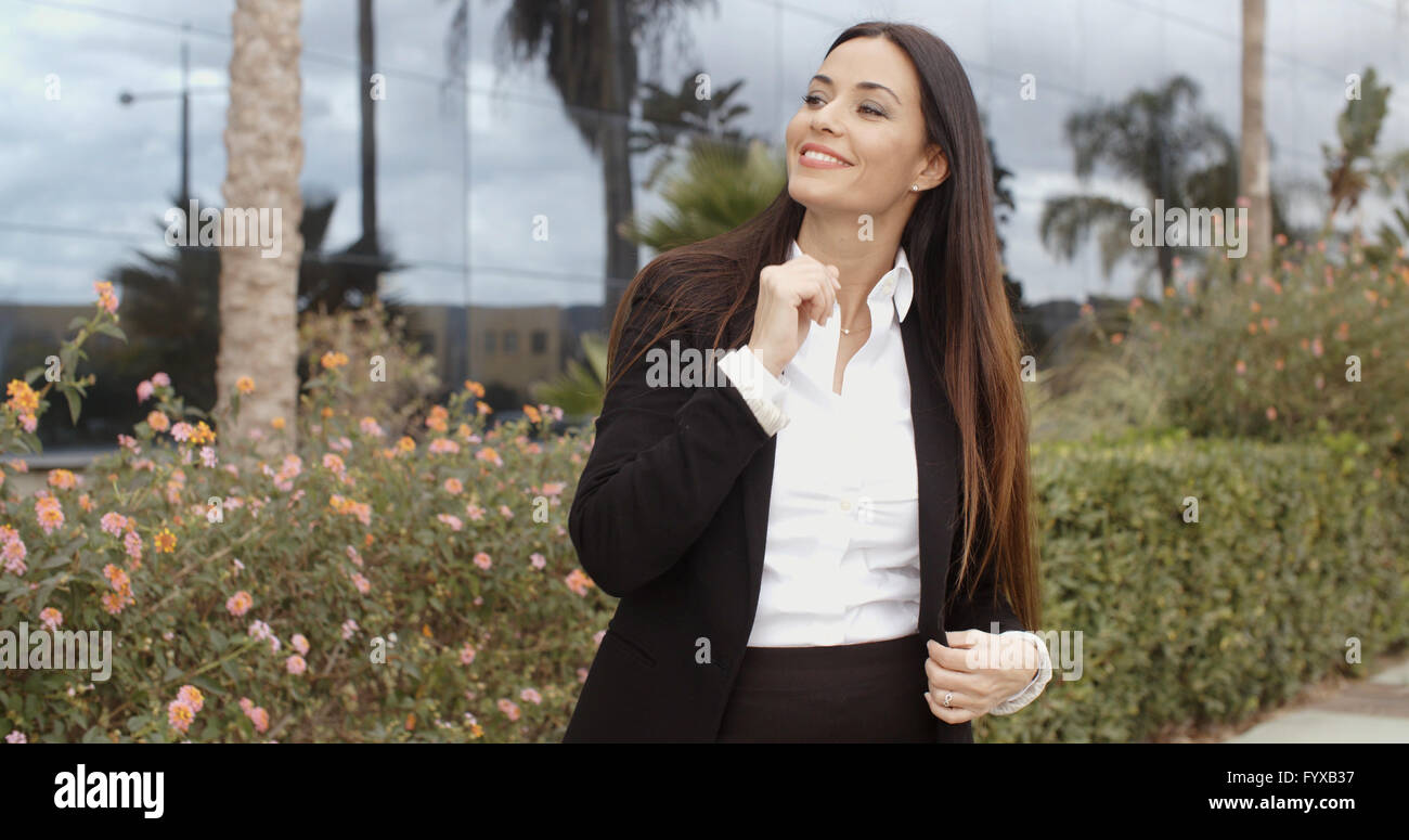Attractive stylish woman waiting for a friend Stock Photo - Alamy