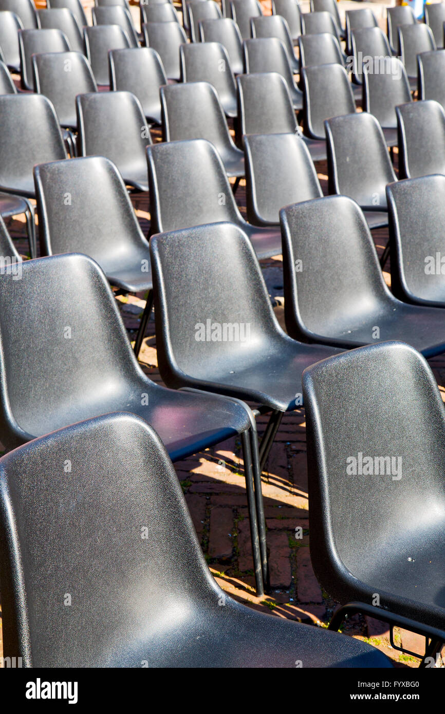 empty seat in background black texture Stock Photo - Alamy