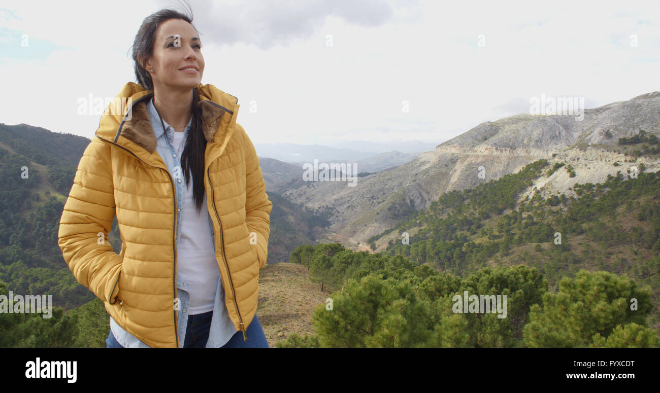 Smiling woman appreciating the peace of nature Stock Photo - Alamy
