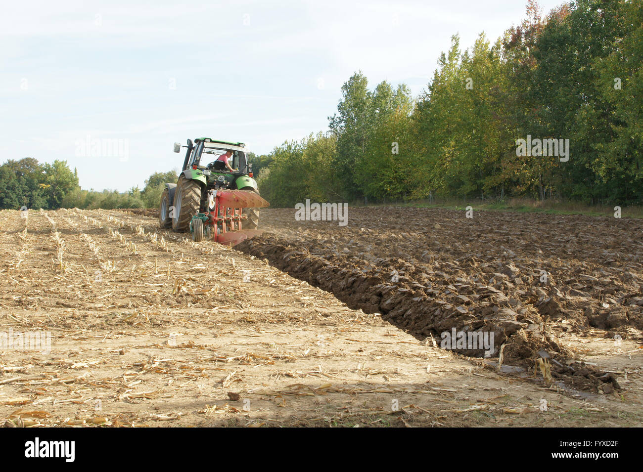 Ploughing field, after maize harvesting Stock Photo - Alamy