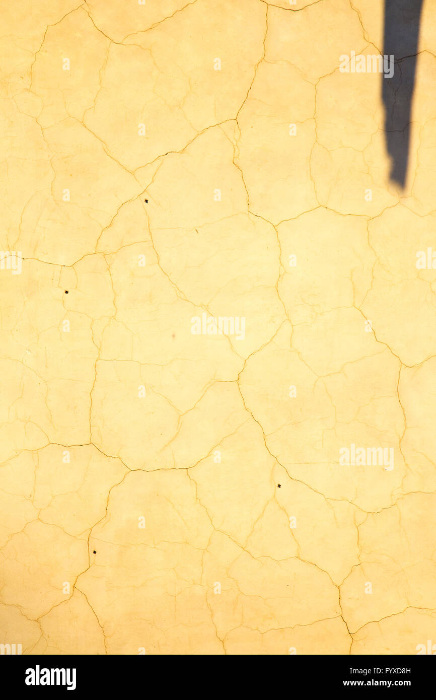 pink in texture wall and yellow shadow Stock Photo - Alamy