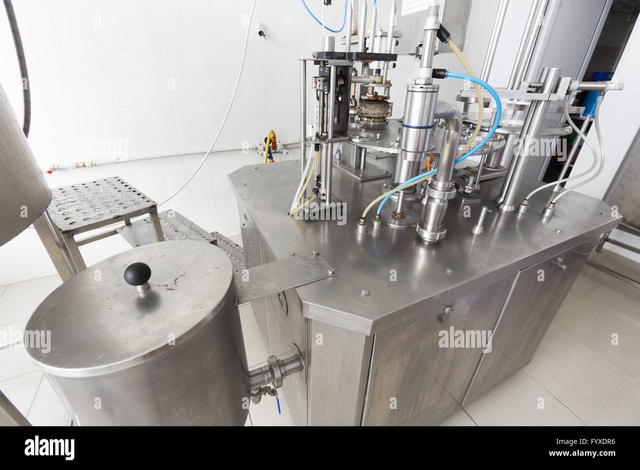 Creamery machine production device Stock Photo - Alamy