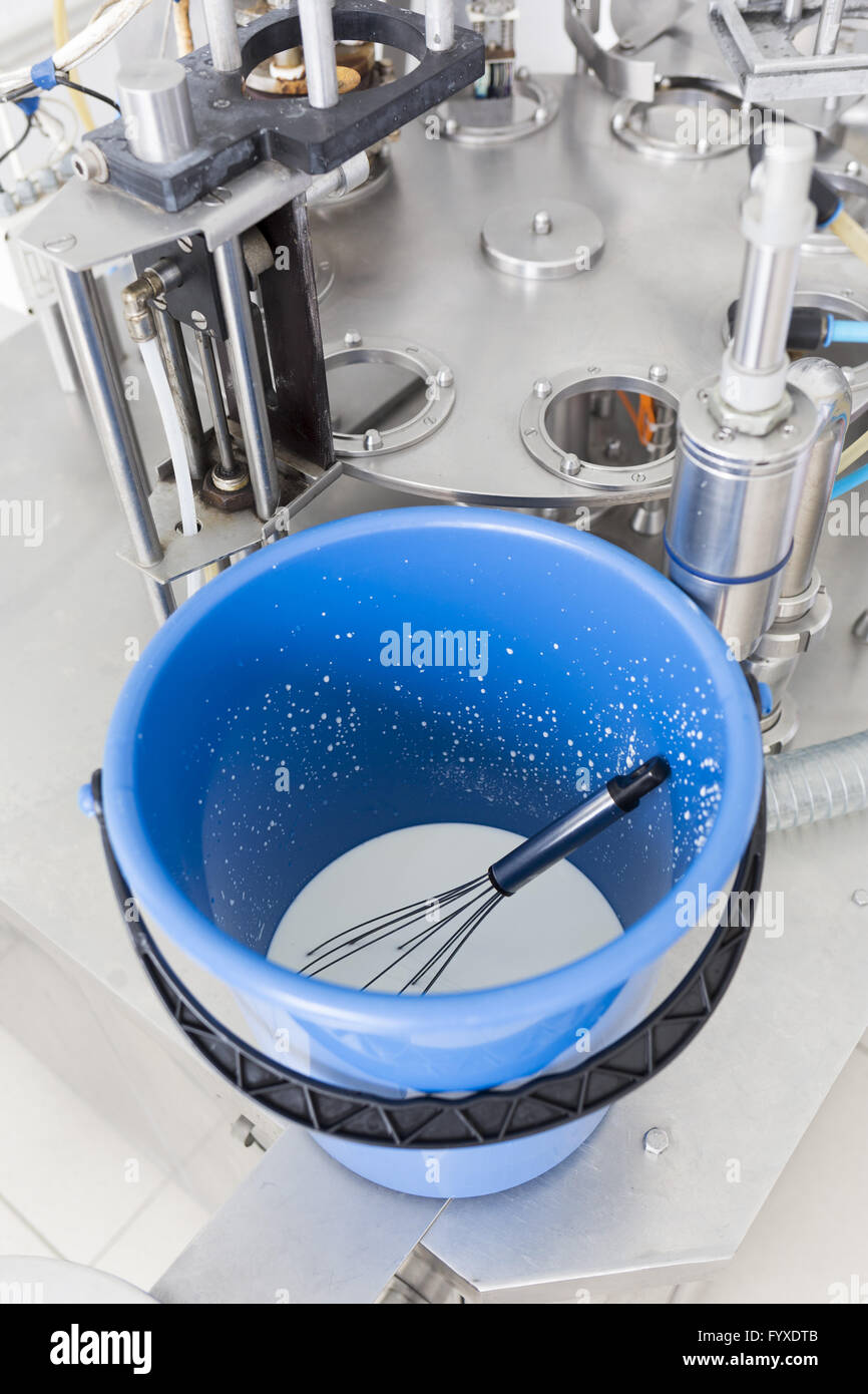 Creamery machine production device Stock Photo - Alamy