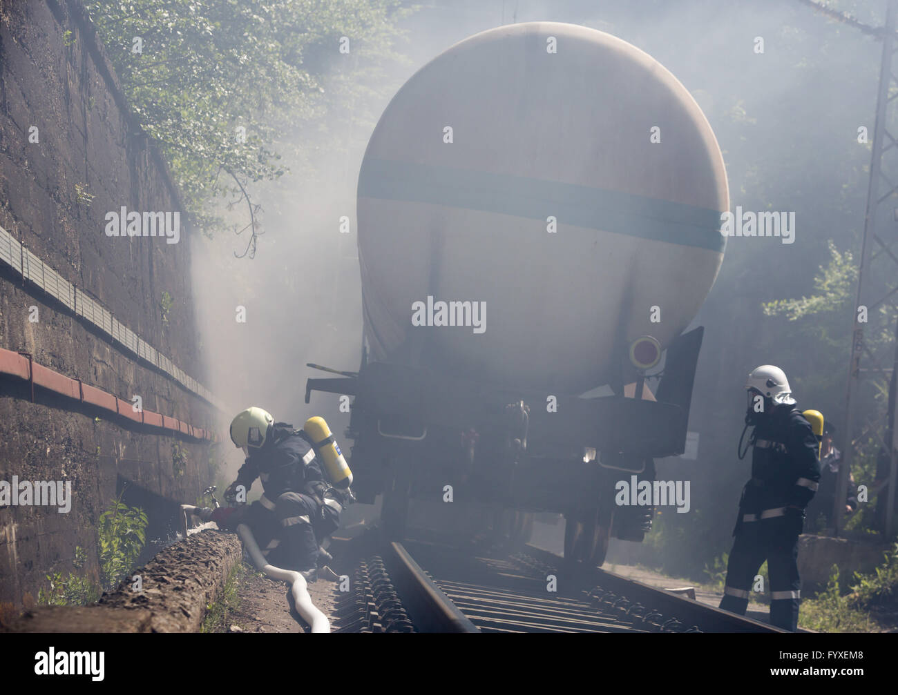 Tanker train fire firefighters Stock Photo - Alamy