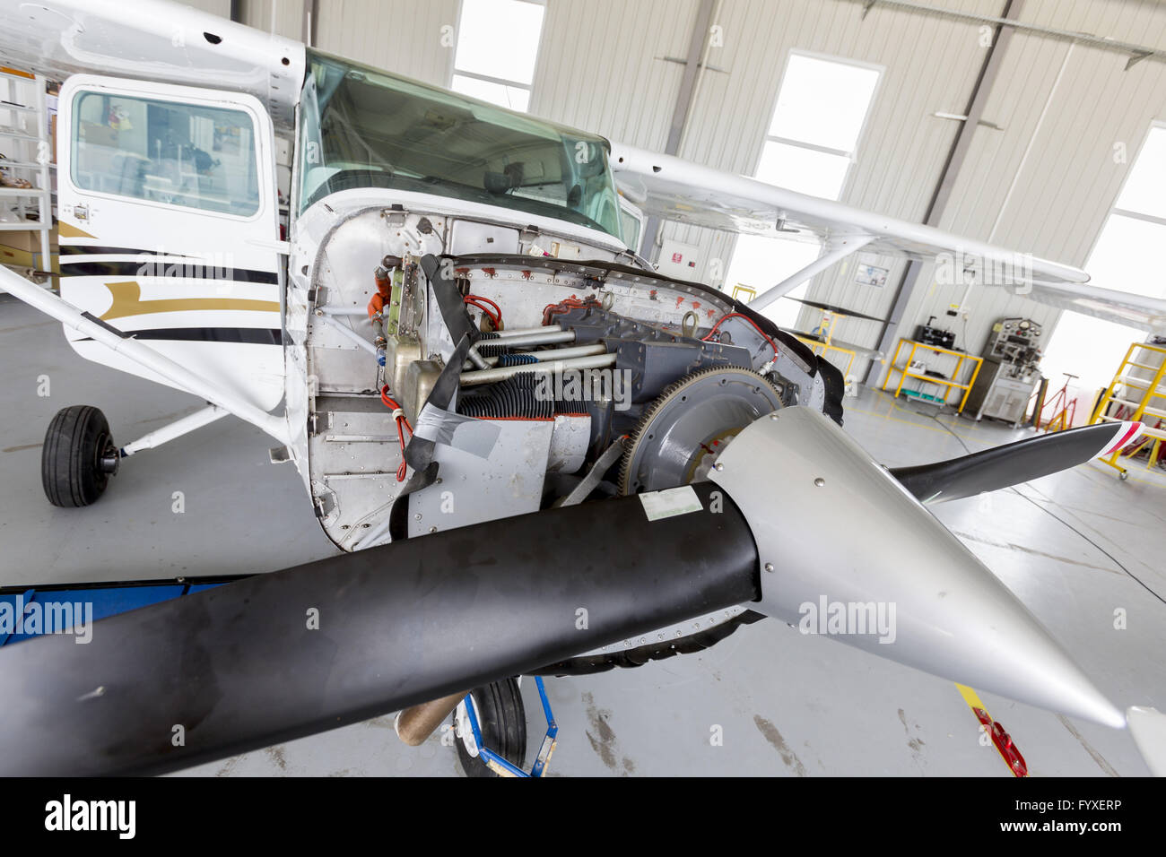 Repairing small propeller airplane Stock Photo - Alamy