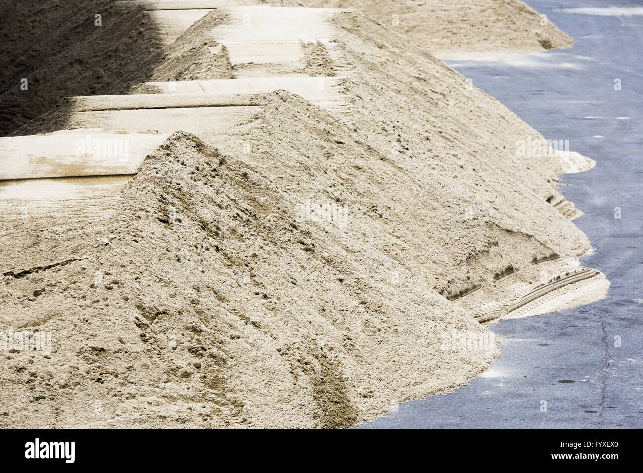 Piles of sand Stock Photo - Alamy