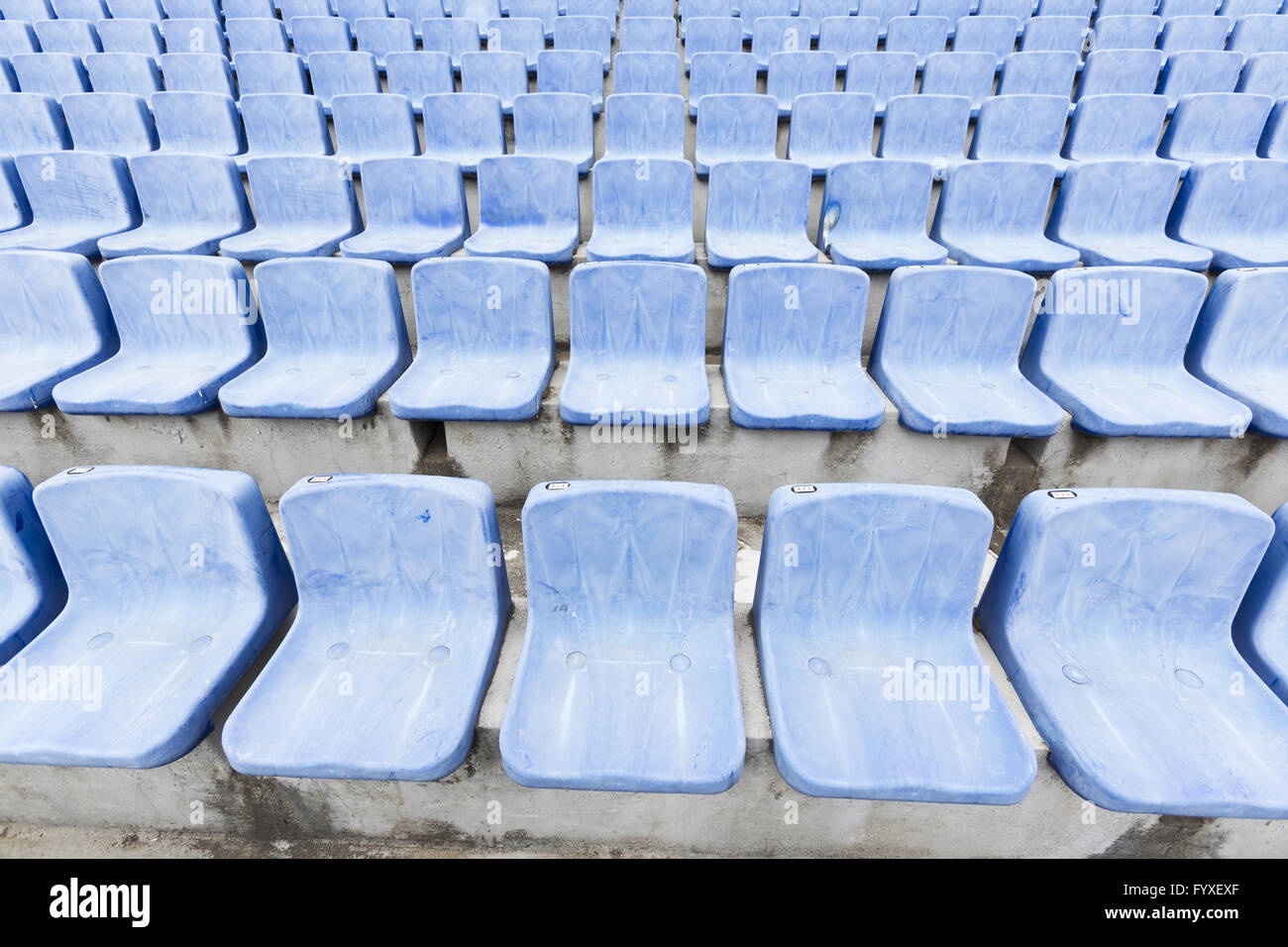 Old blue stadium seats Stock Photo - Alamy