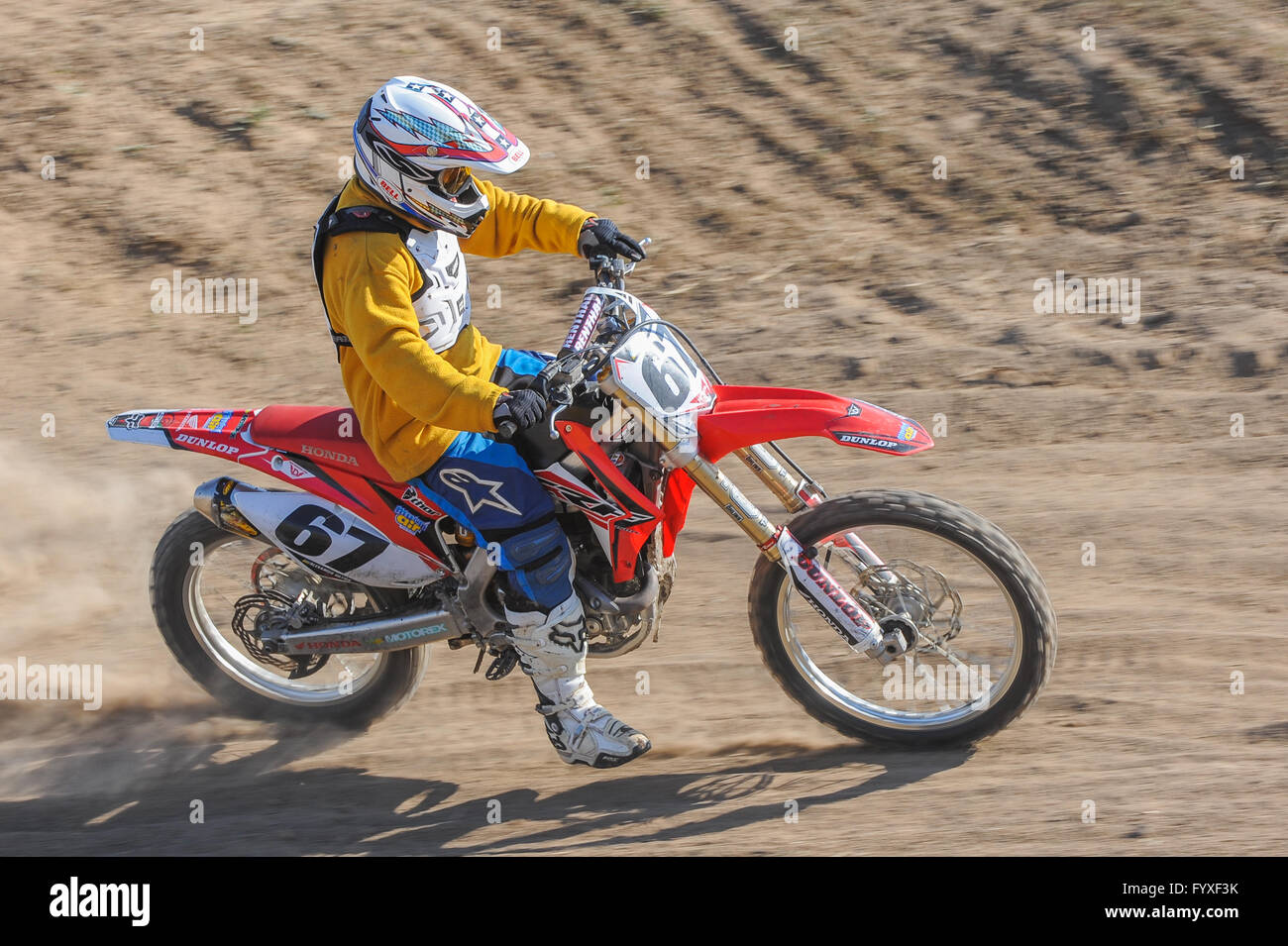 Motocross rider on a track Stock Photo - Alamy