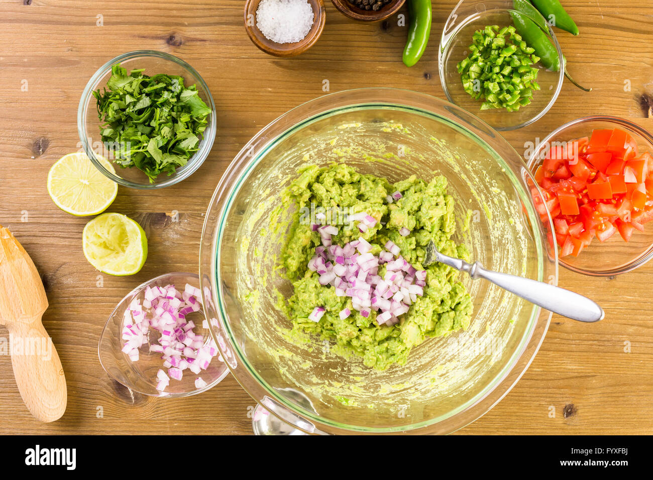 Preparing homemade guacamole from organic produce Stock Photo - Alamy