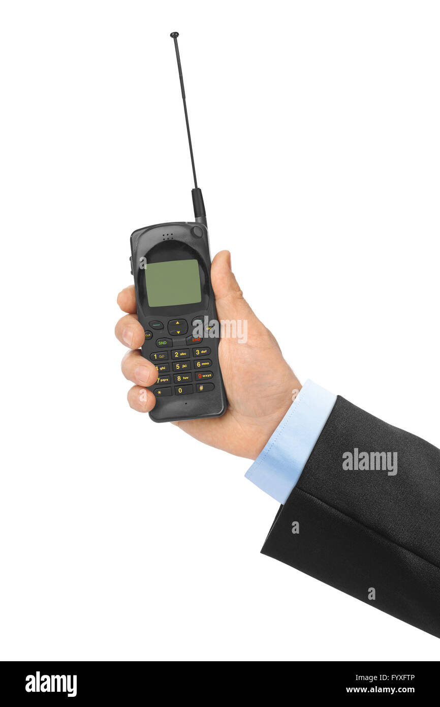 Hand with retro mobile phone Stock Photo - Alamy