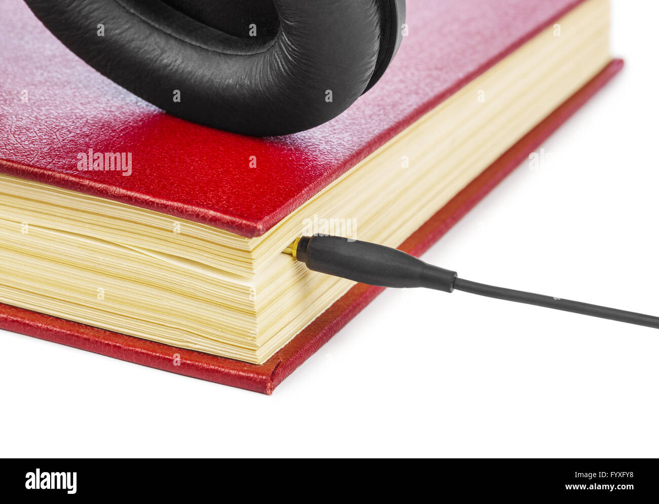 Headphones and book Stock Photo - Alamy