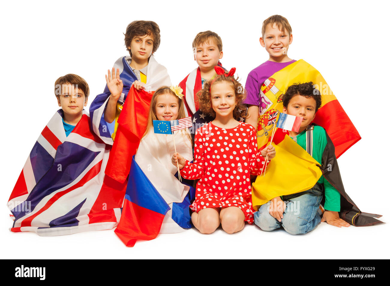 Seven kids with flags wrapped in different banners Stock Photo - Alamy