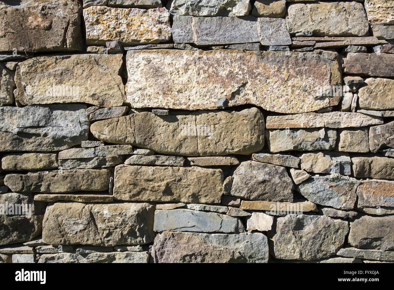 Masonry stone wall Stock Photo - Alamy