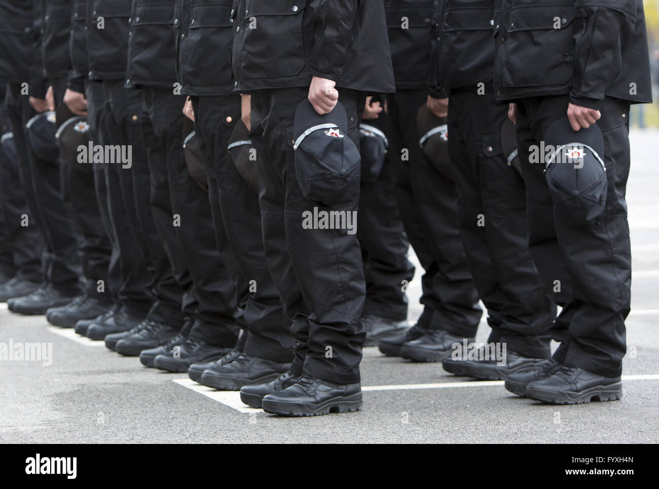 Policemen legs and boots Stock Photo - Alamy