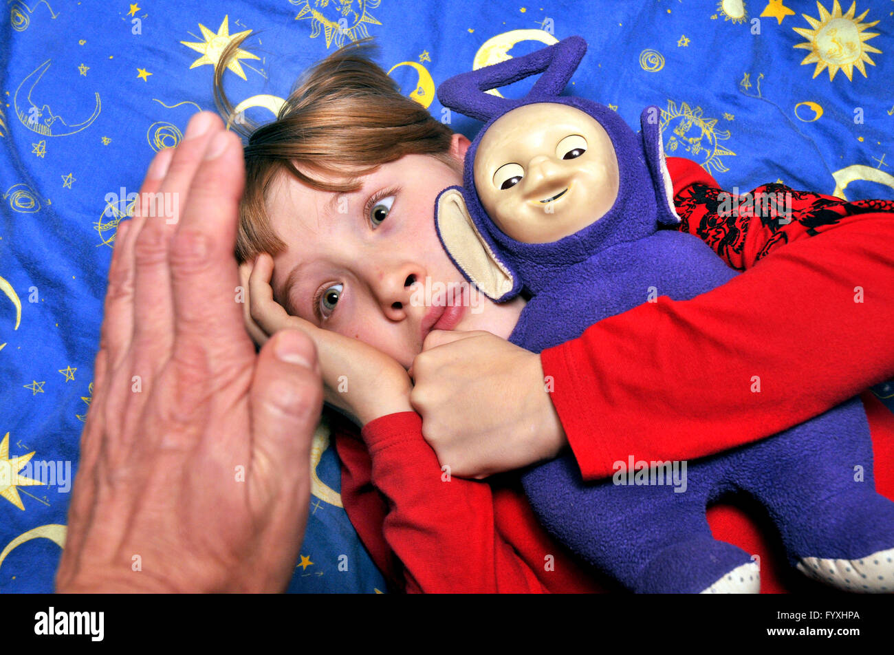 Boy being maltreated, mishandling, mistreating, bed Stock Photo - Alamy