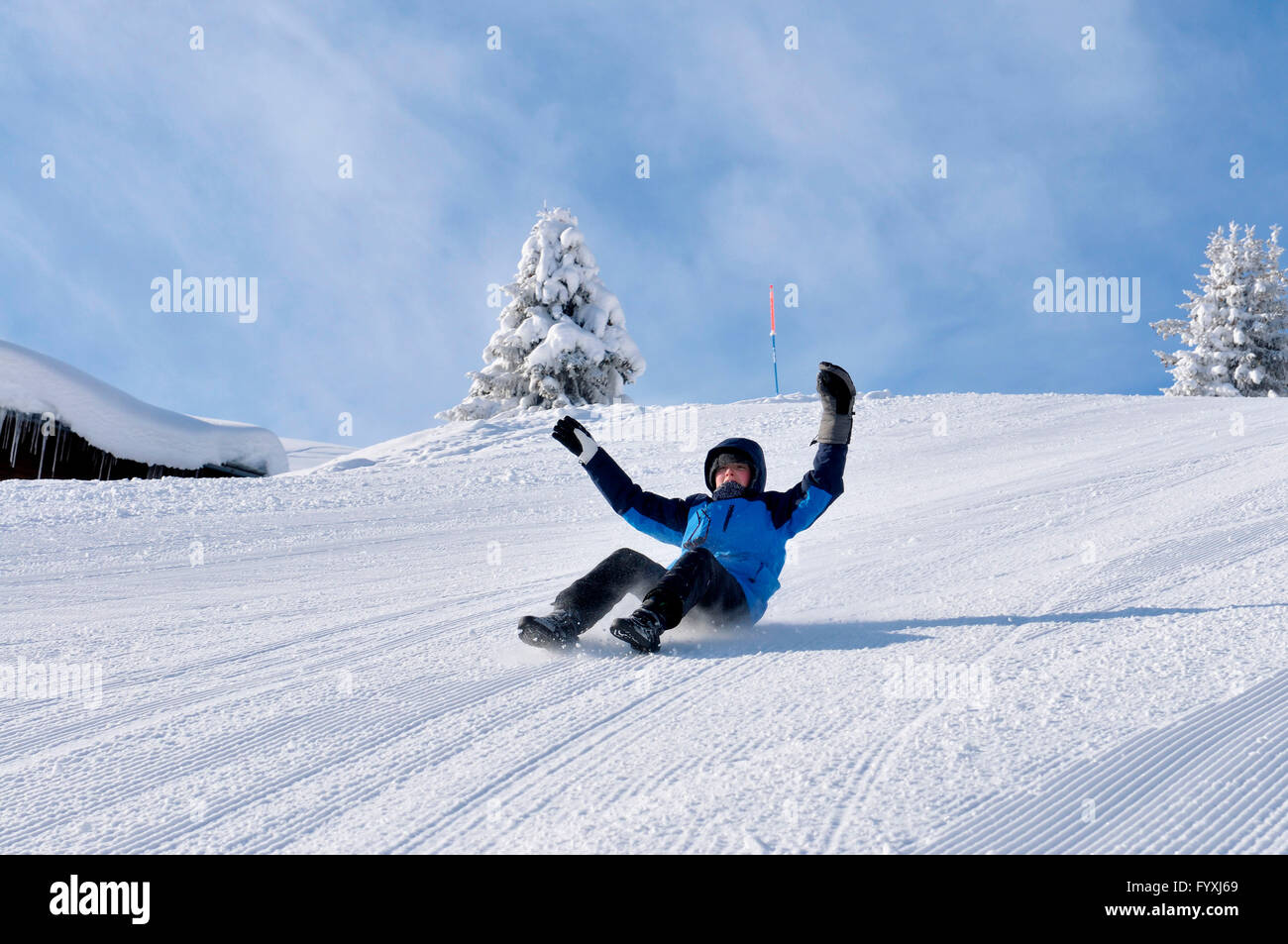 Sliding in the snow hi-res stock photography and images - Alamy