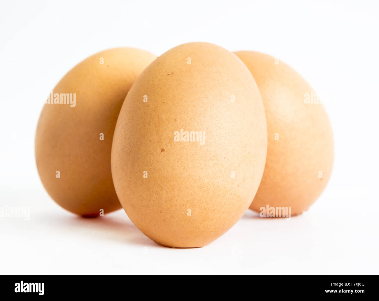 Three eggs isolated Stock Photo - Alamy