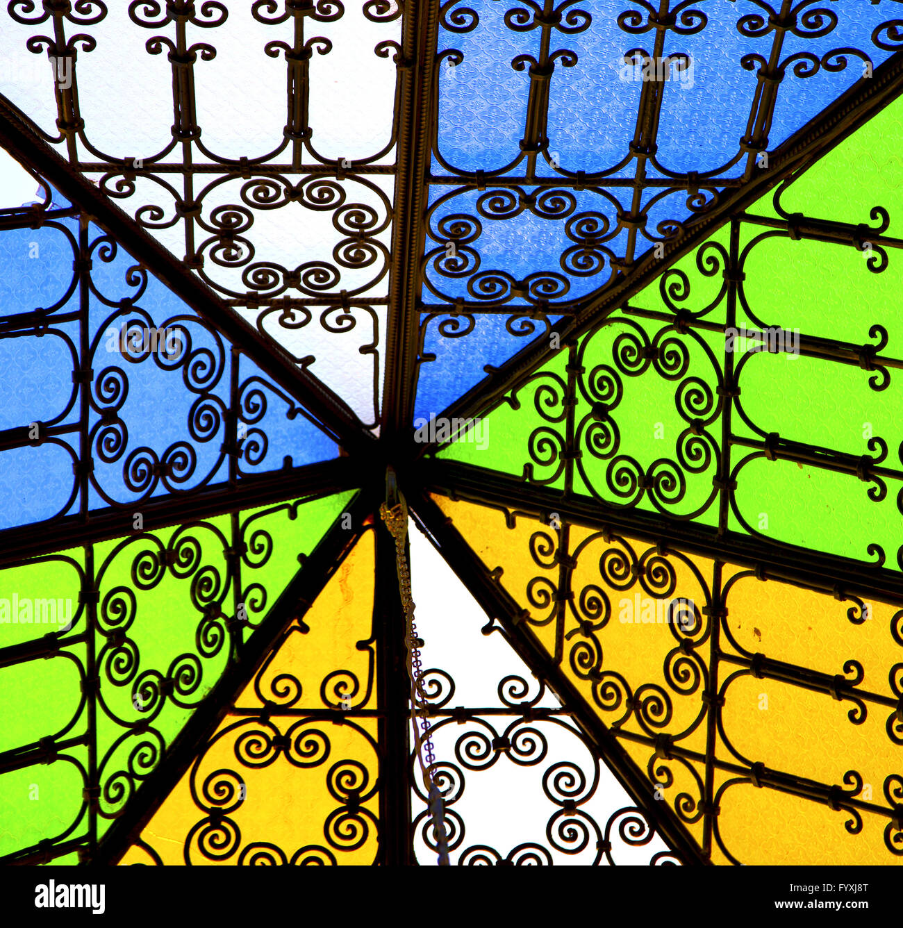 colorated glass and sun in morocco africa window and light Stock Photo ...
