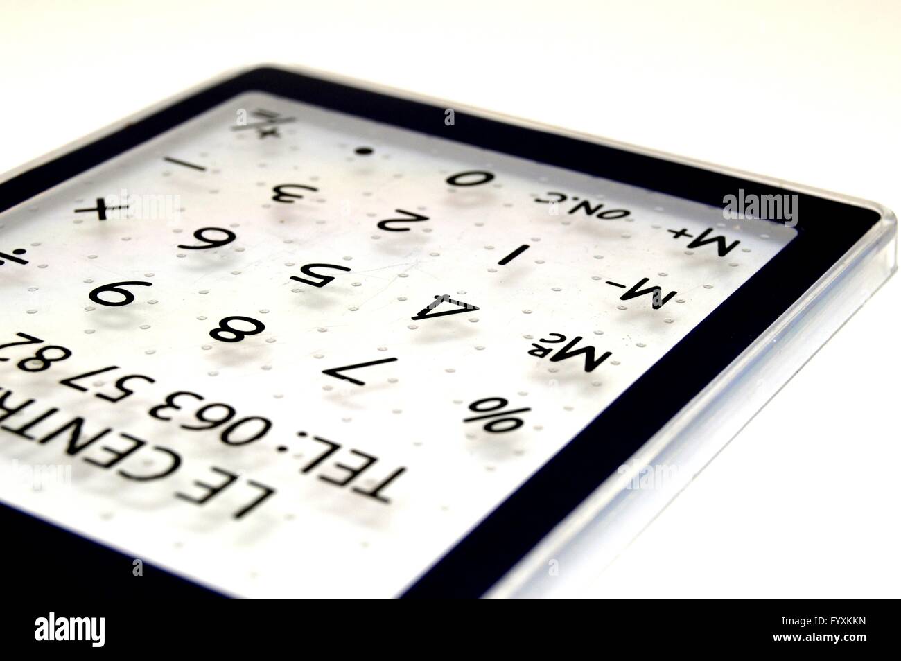A transparent calculator with figures and address Stock Photo - Alamy