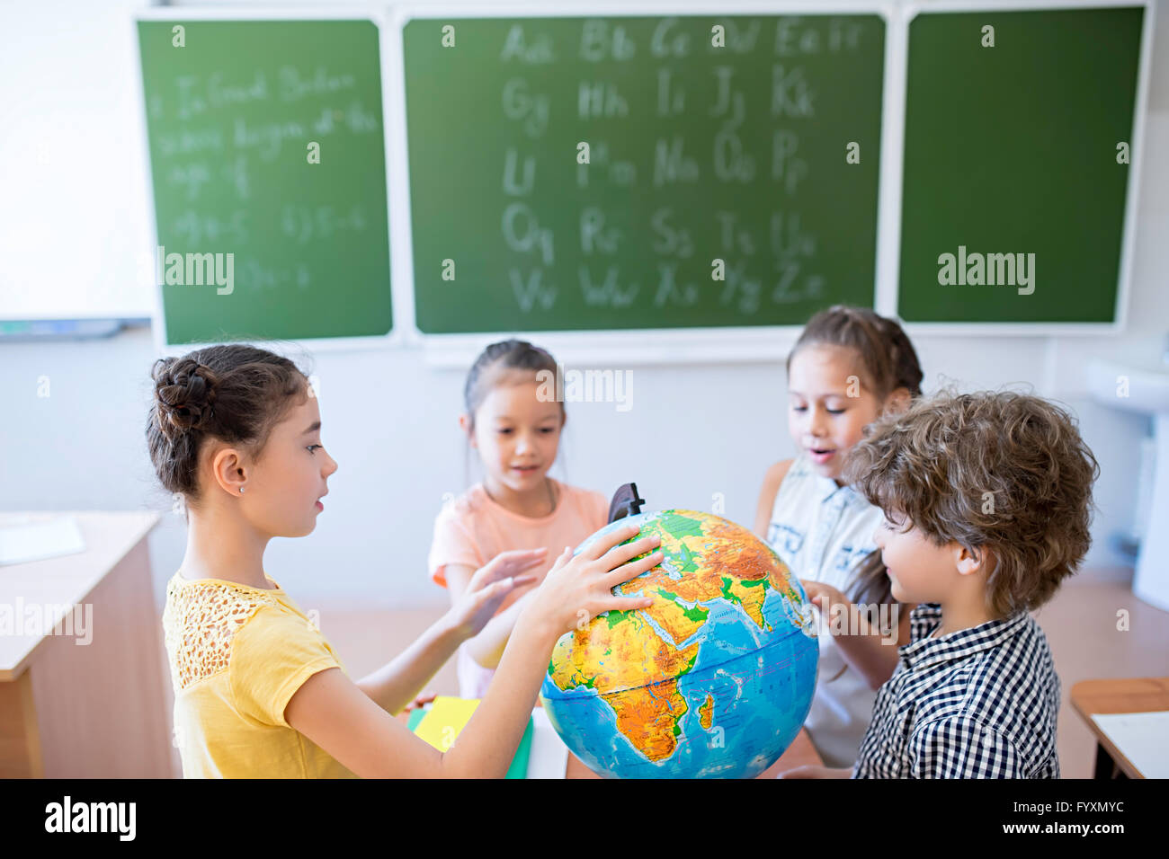 Children learning geography hi-res stock photography and images - Alamy