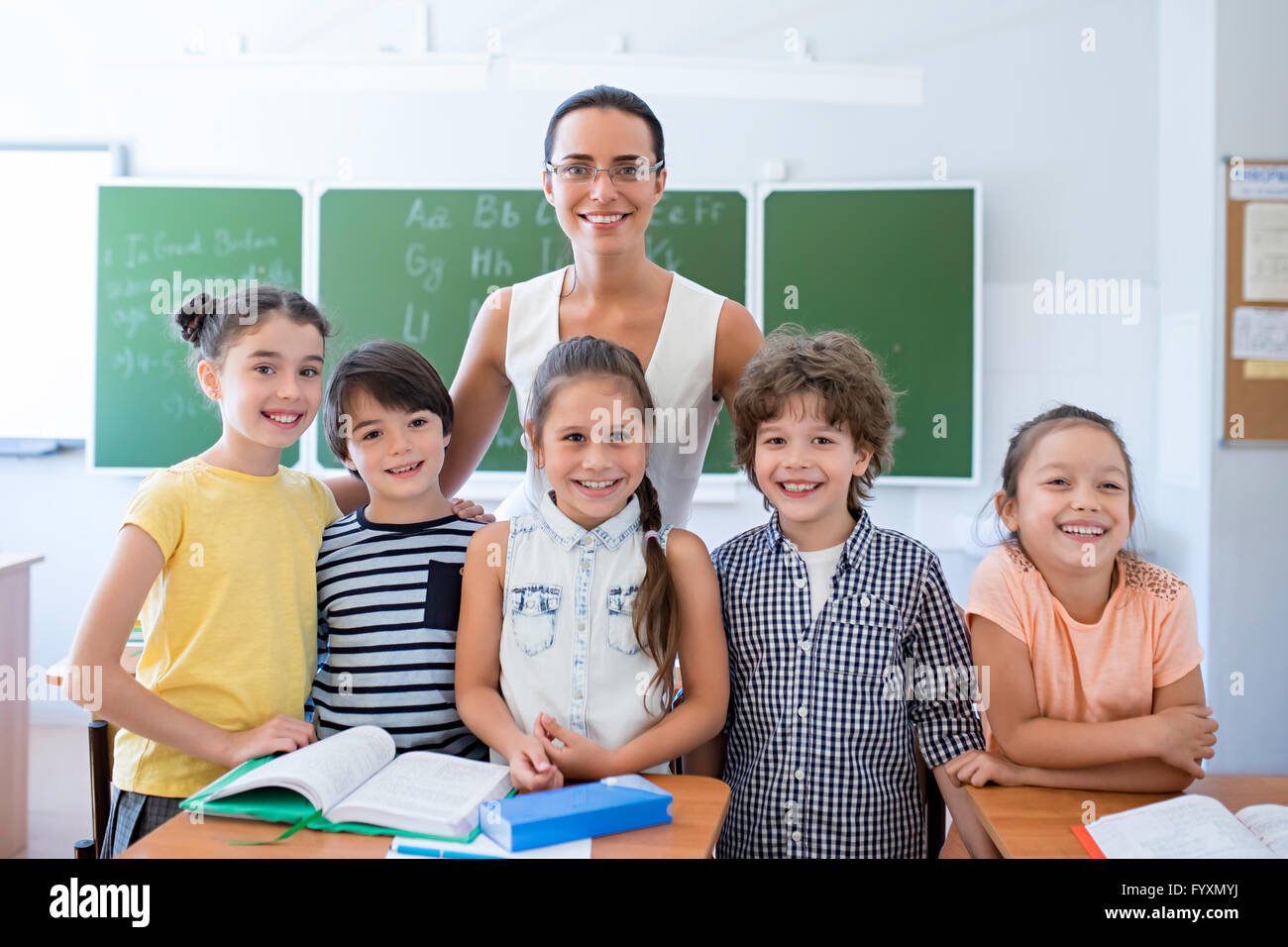 Pupils with teacher Stock Photo - Alamy