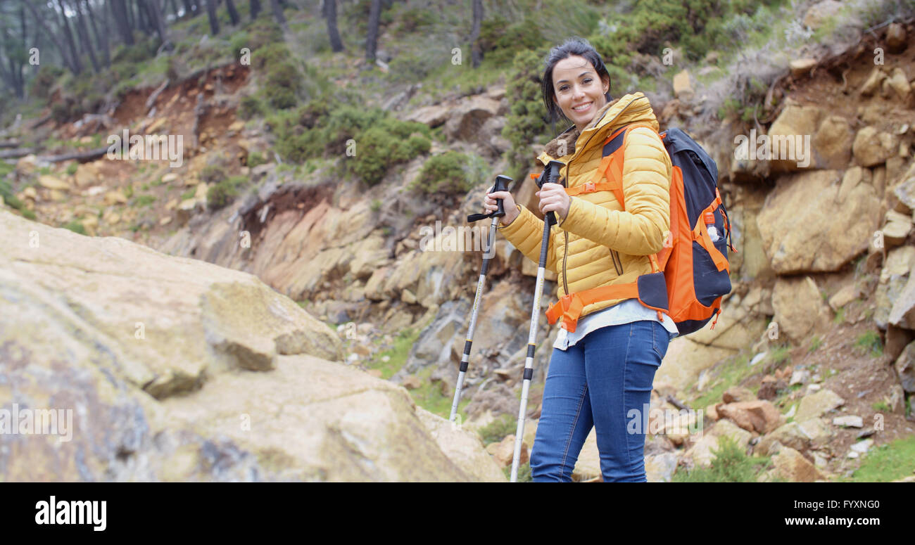 Healthy fit young woman outdoors backpacking Stock Photo - Alamy