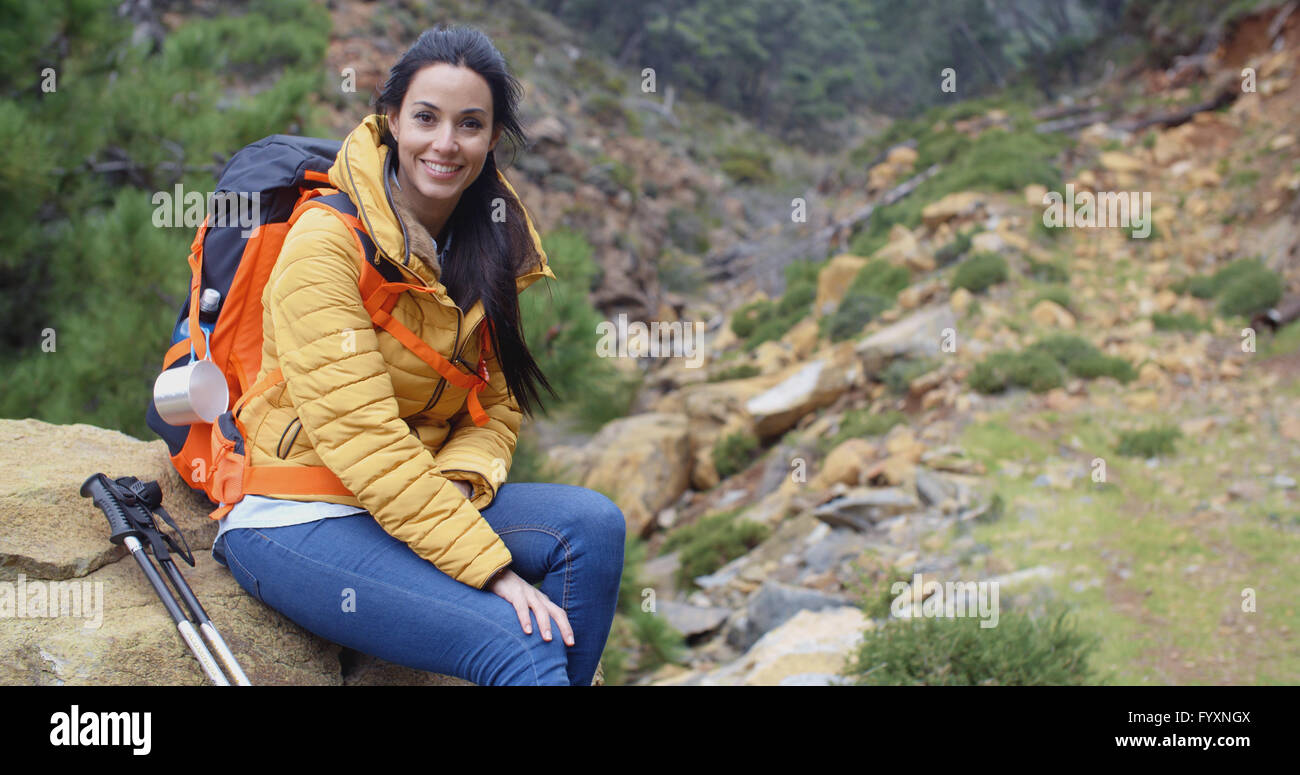 Young backpacker relaxing to enjoy the view Stock Photo - Alamy