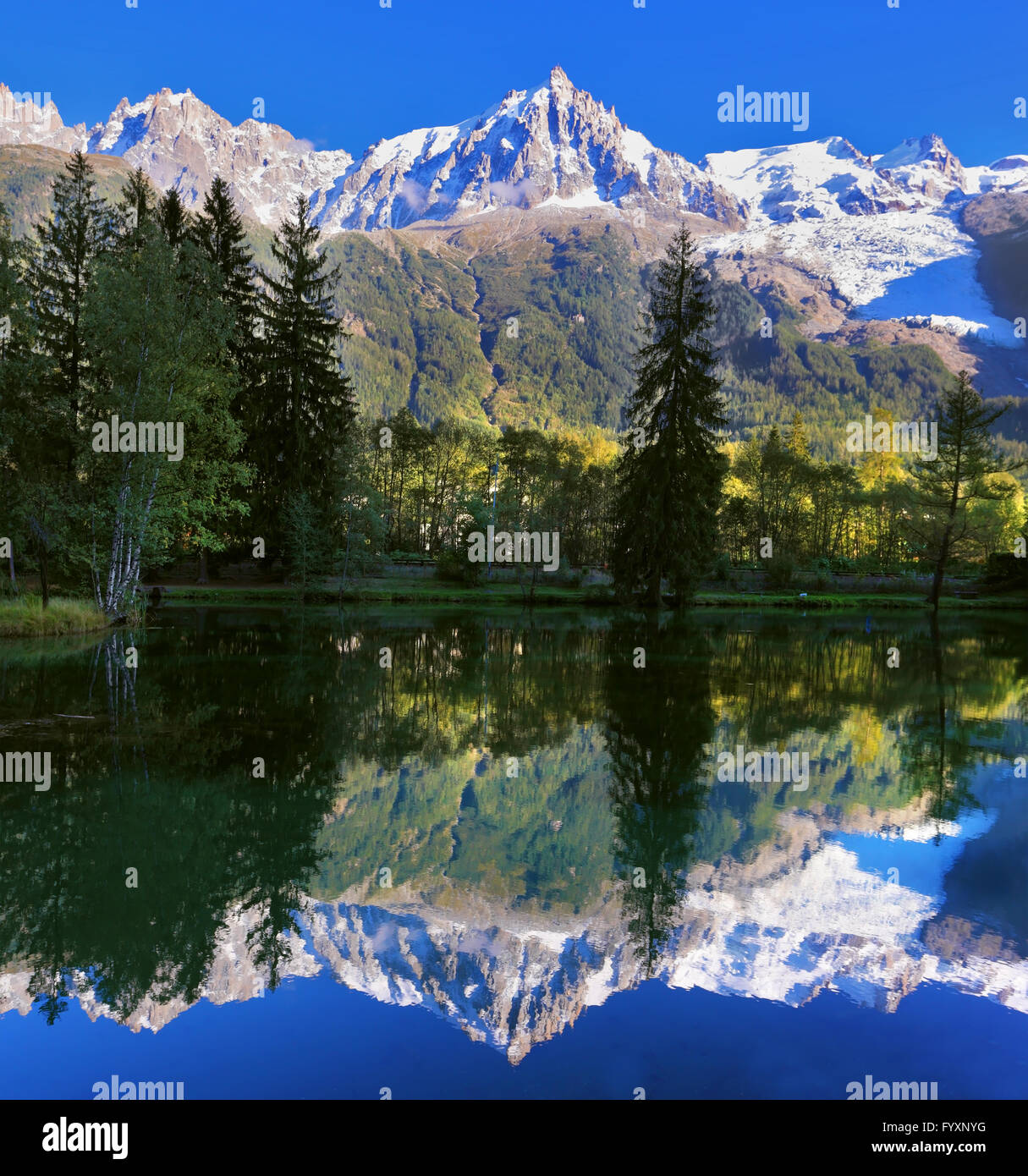 Gorgeous reflection in the smooth water Stock Photo - Alamy