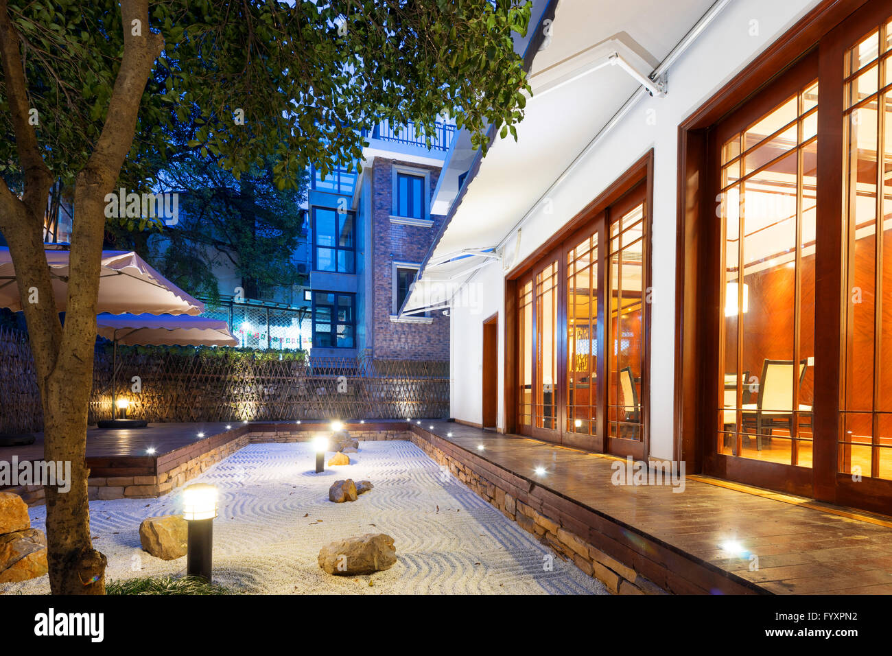 footpath front of modern building at night Stock Photo - Alamy