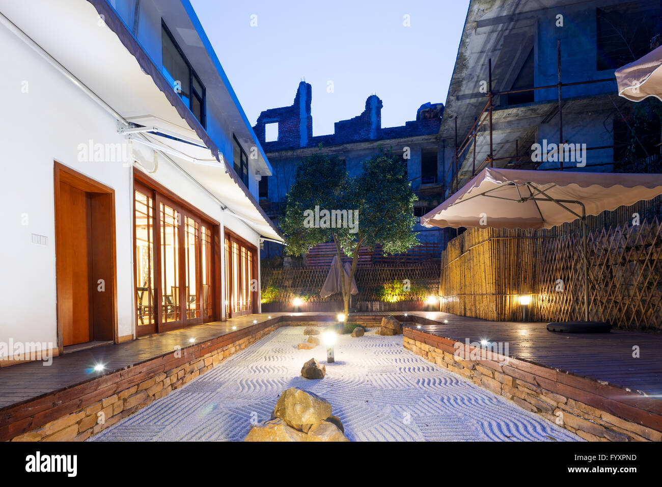 footpath front of modern building at night Stock Photo - Alamy