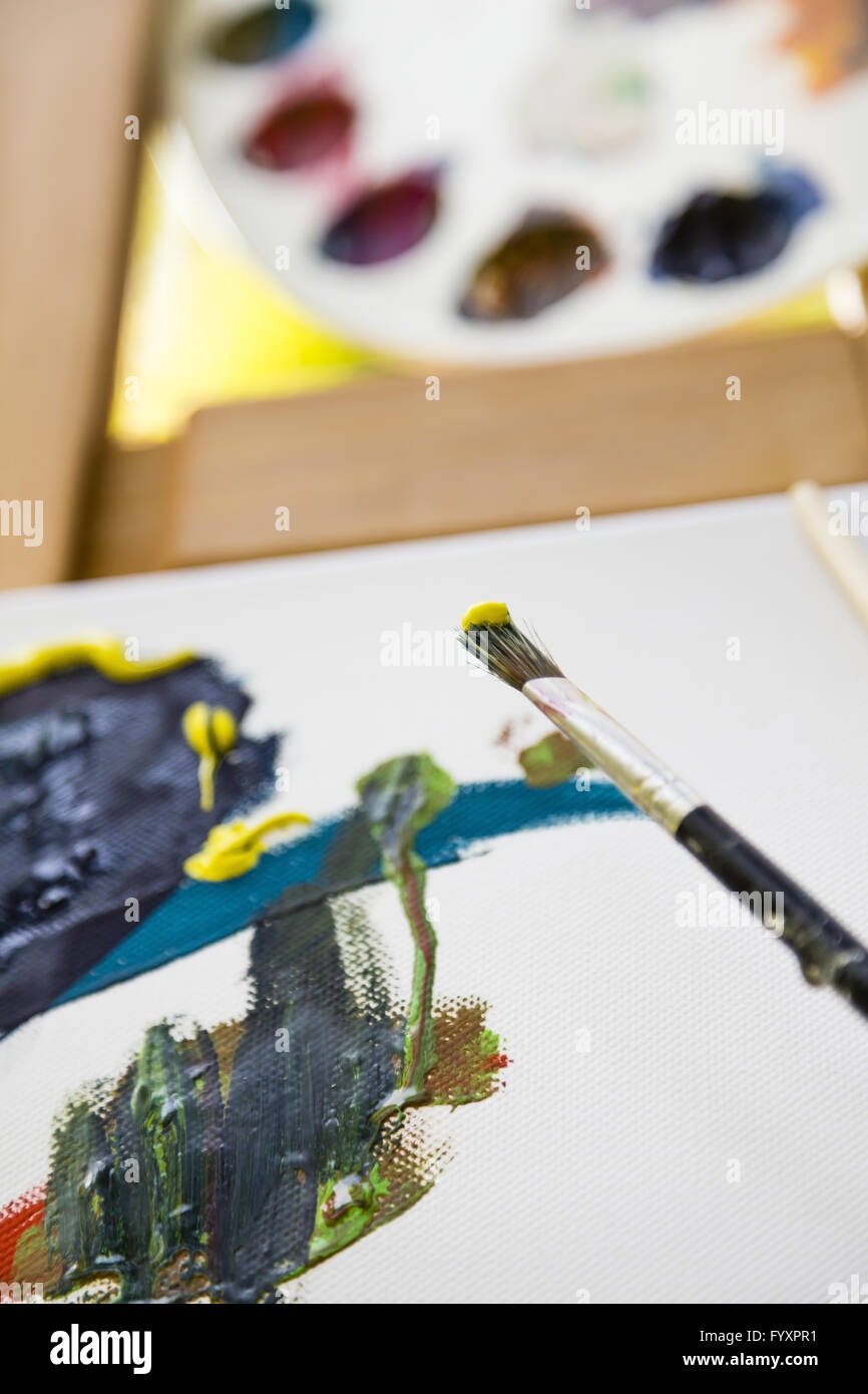 paint brush with color and canvas Stock Photo - Alamy