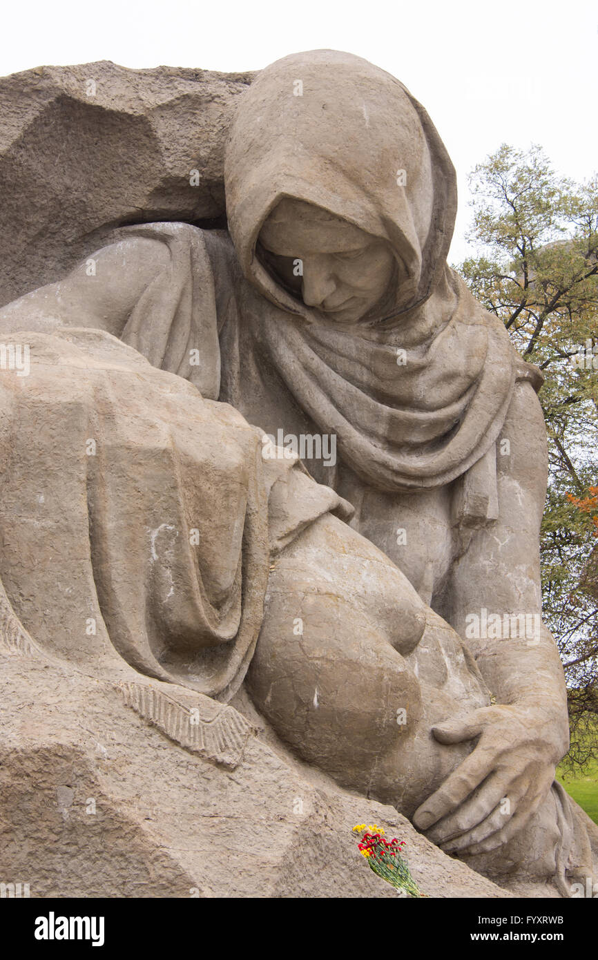 Sculpture mourning mother close-up on the area of grief historical ...