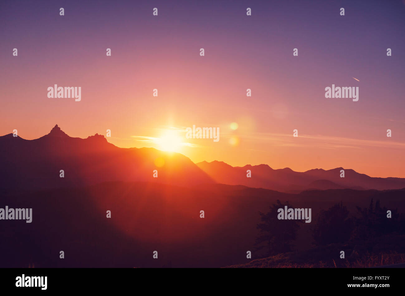 Mountains on sunset Stock Photo - Alamy