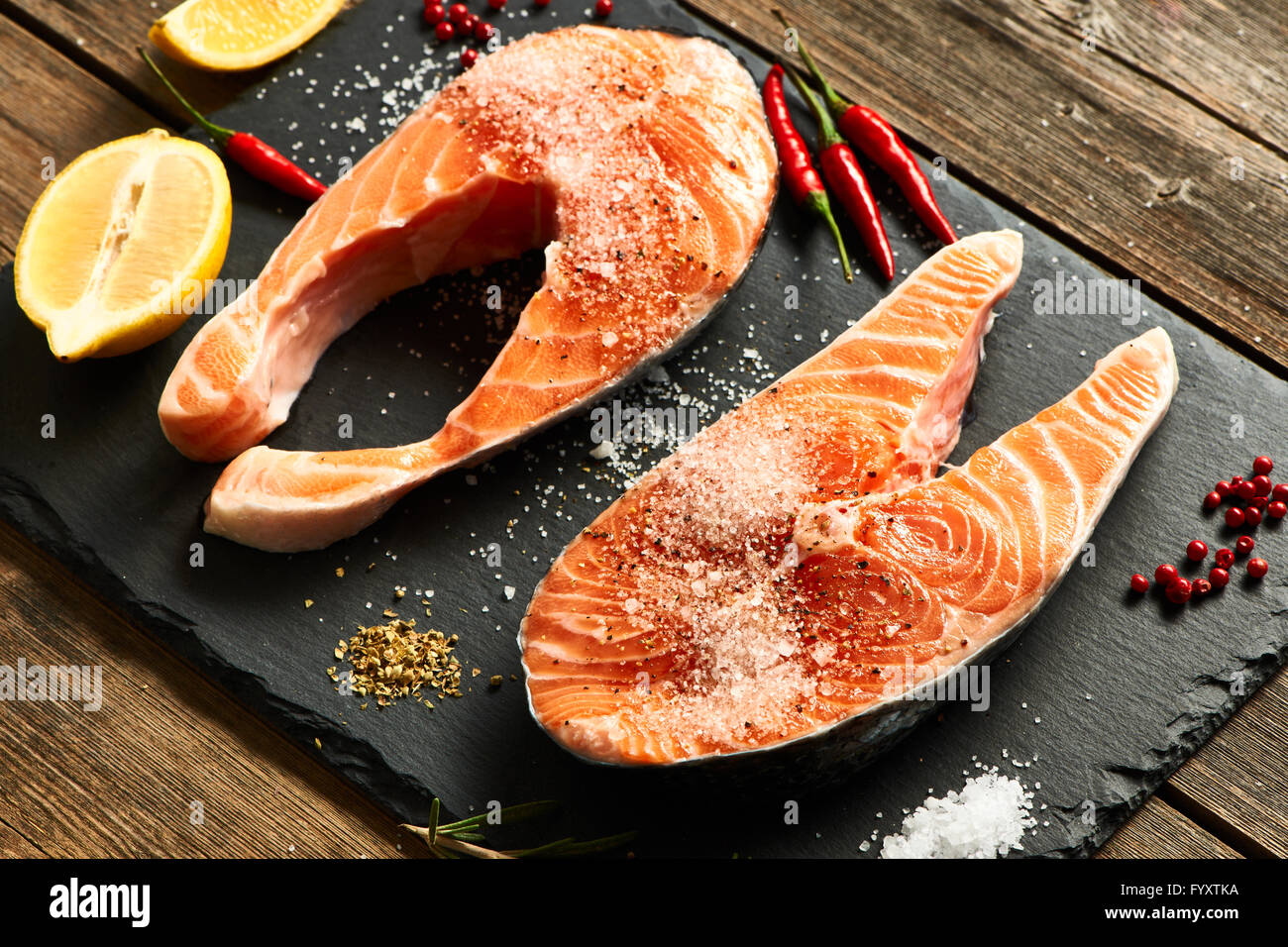 Raw salmon steaks Stock Photo - Alamy