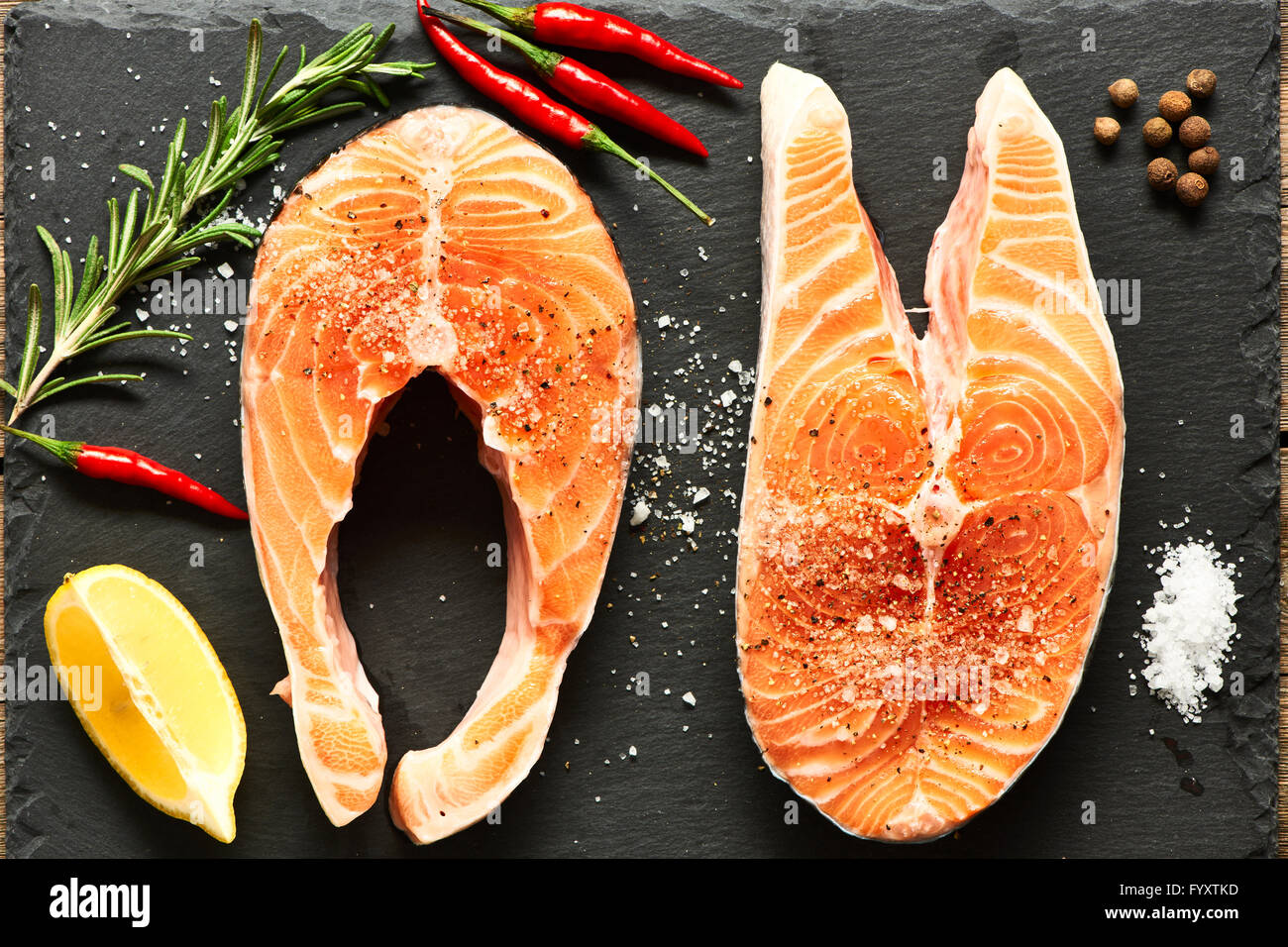 Raw salmon steaks Stock Photo - Alamy