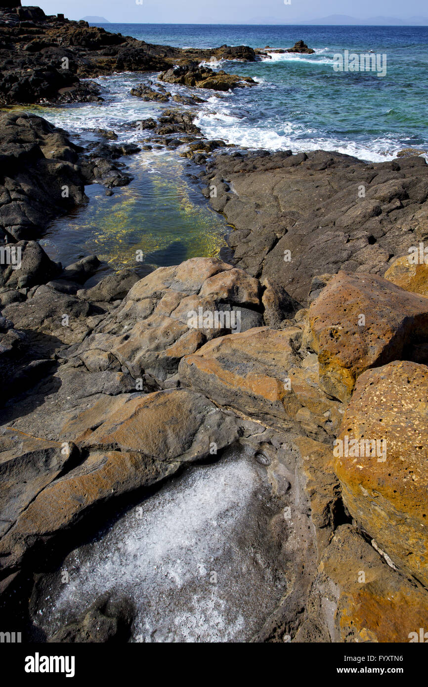 salt in lanzarote isle foam rock Stock Photo - Alamy
