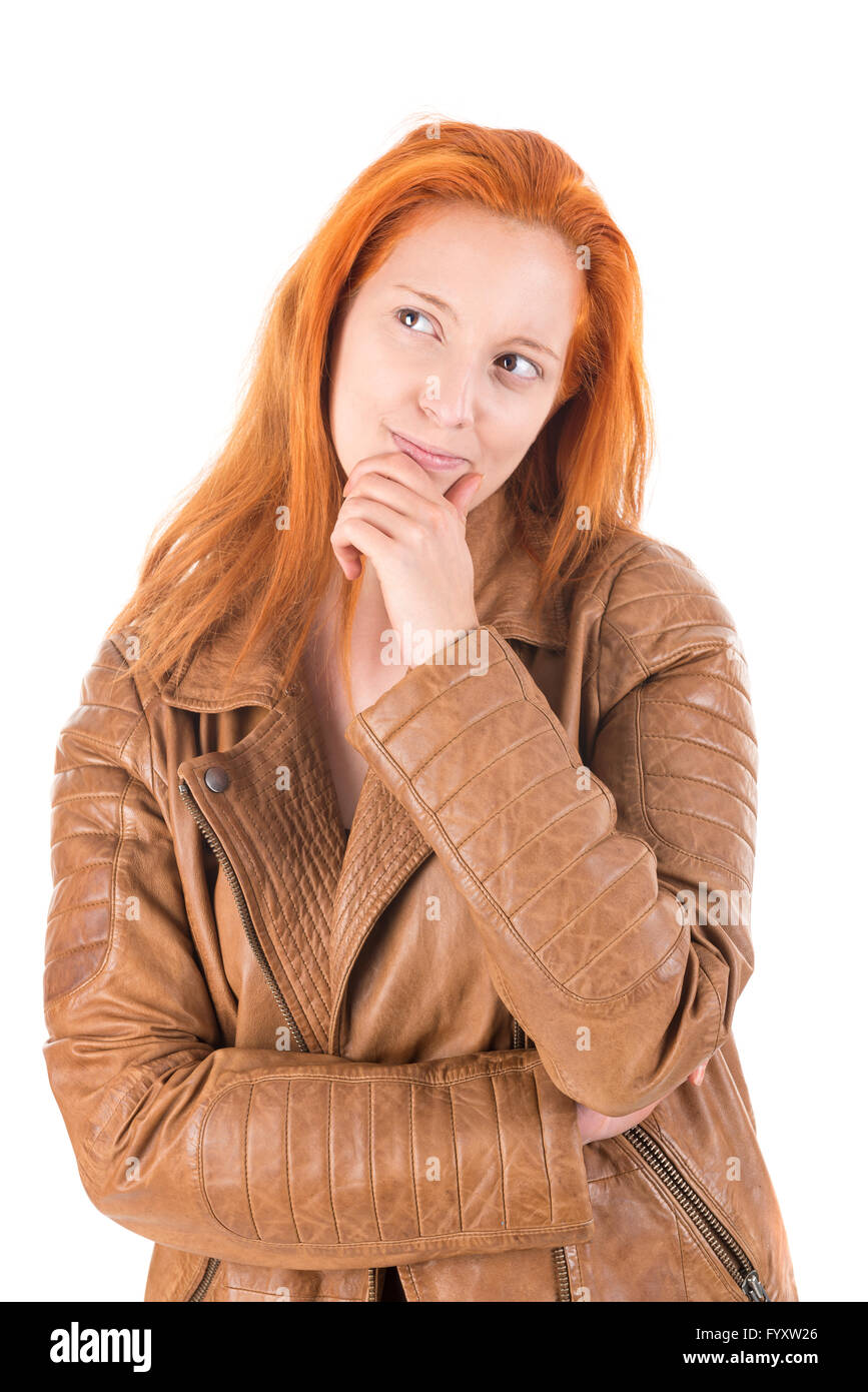 Beautiful red hair girl thinking isolated in white Stock Photo - Alamy