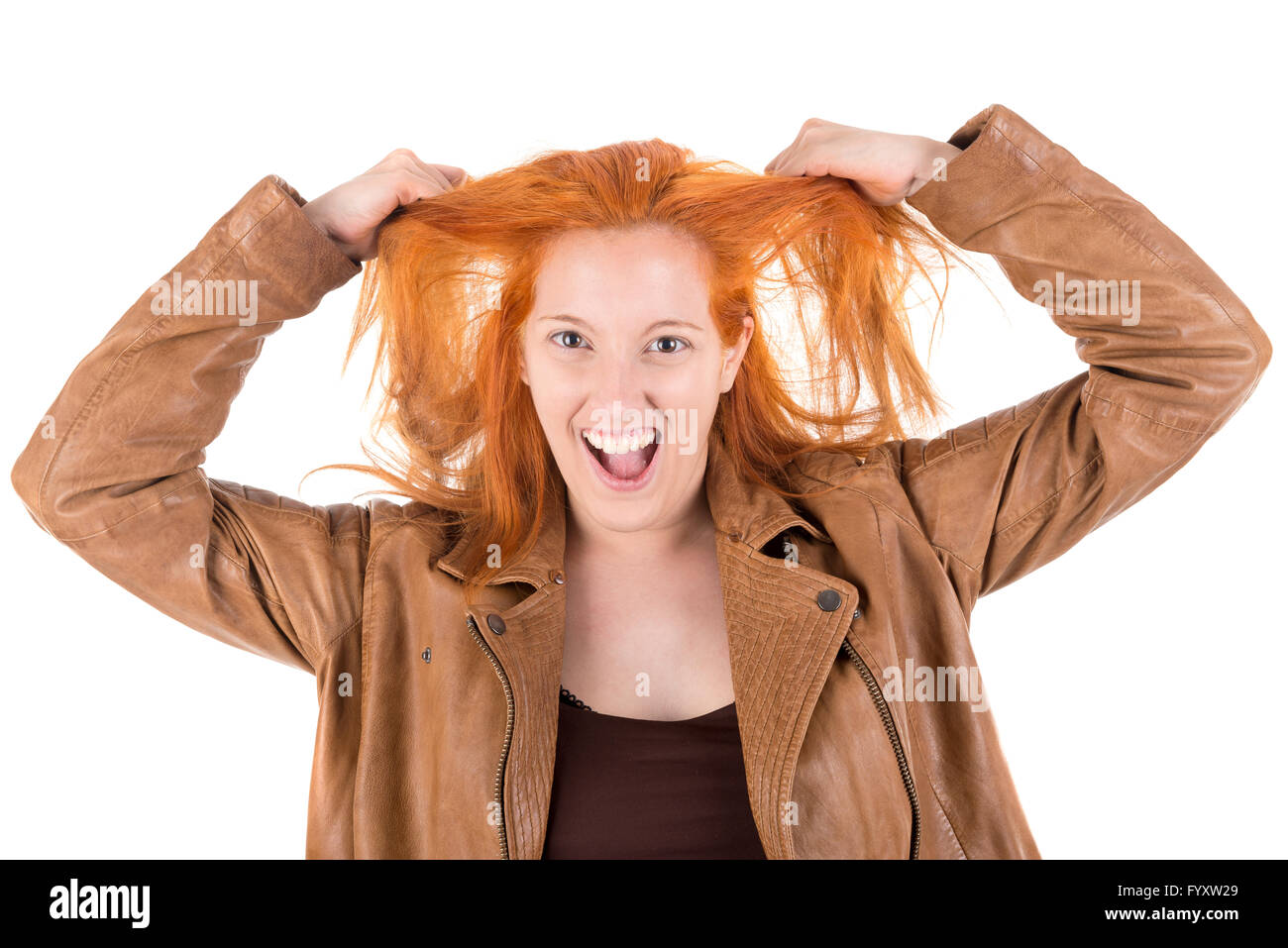 Stressed red hair girl isolated in white Stock Photo - Alamy