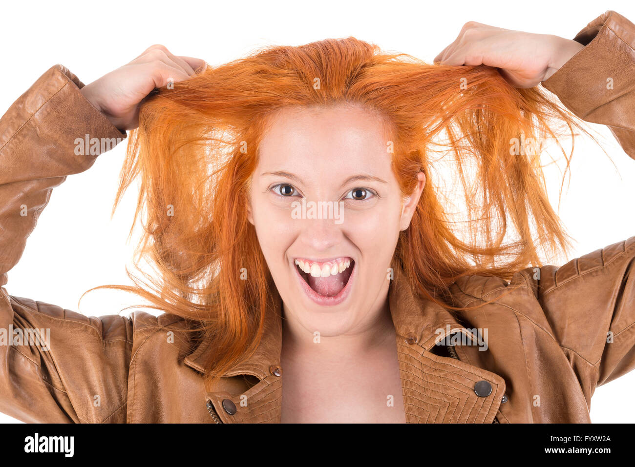 Stressed red hair girl isolated in white Stock Photo - Alamy