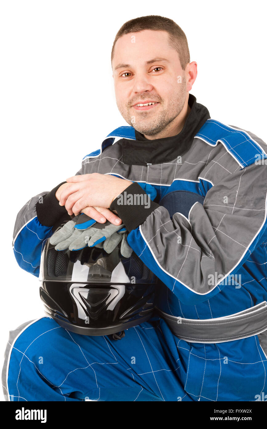Racing driver posing with helmet isolated in white Stock Photo - Alamy