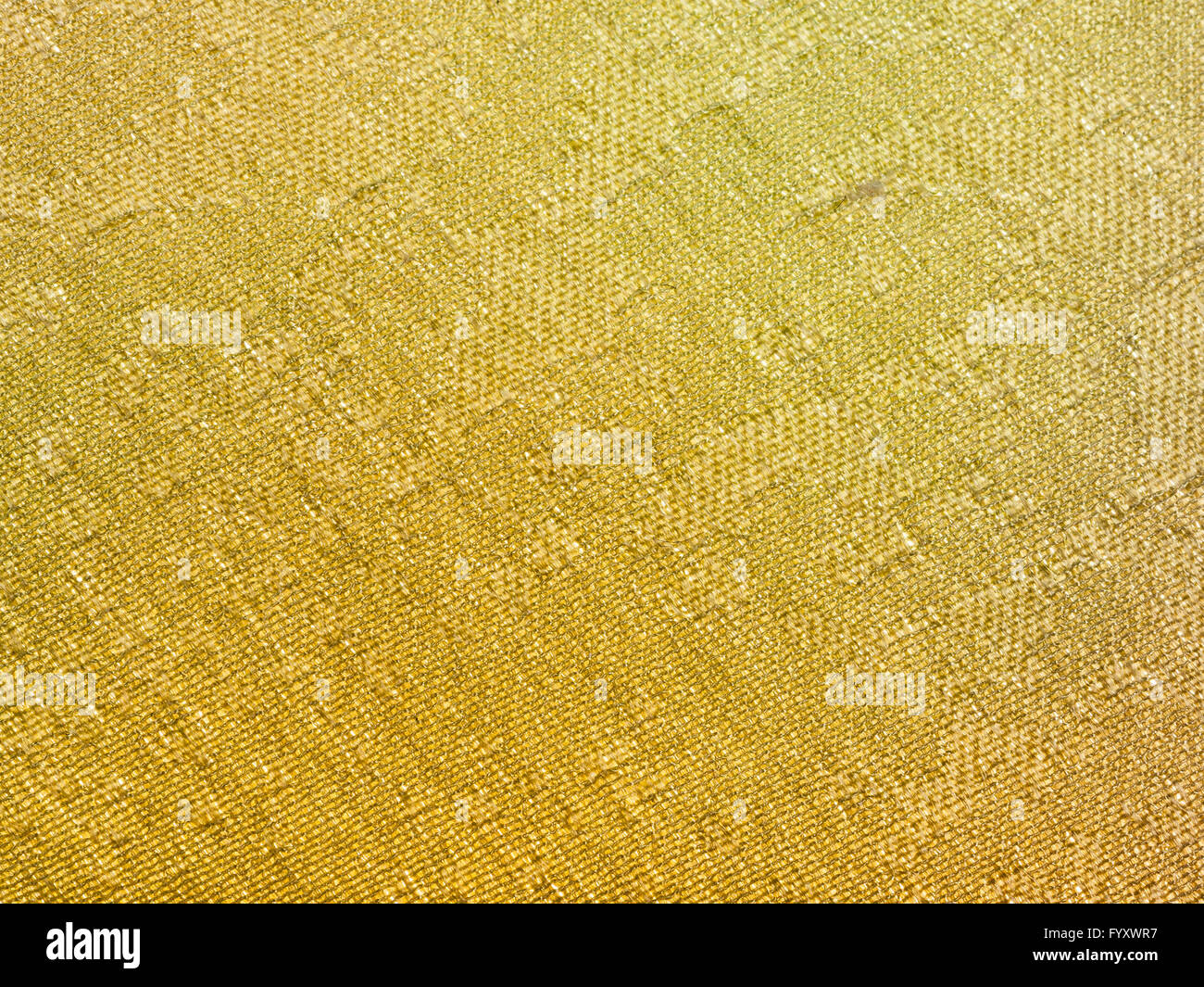 textile background - yellow colored silk fabric with Jacquard weave ...