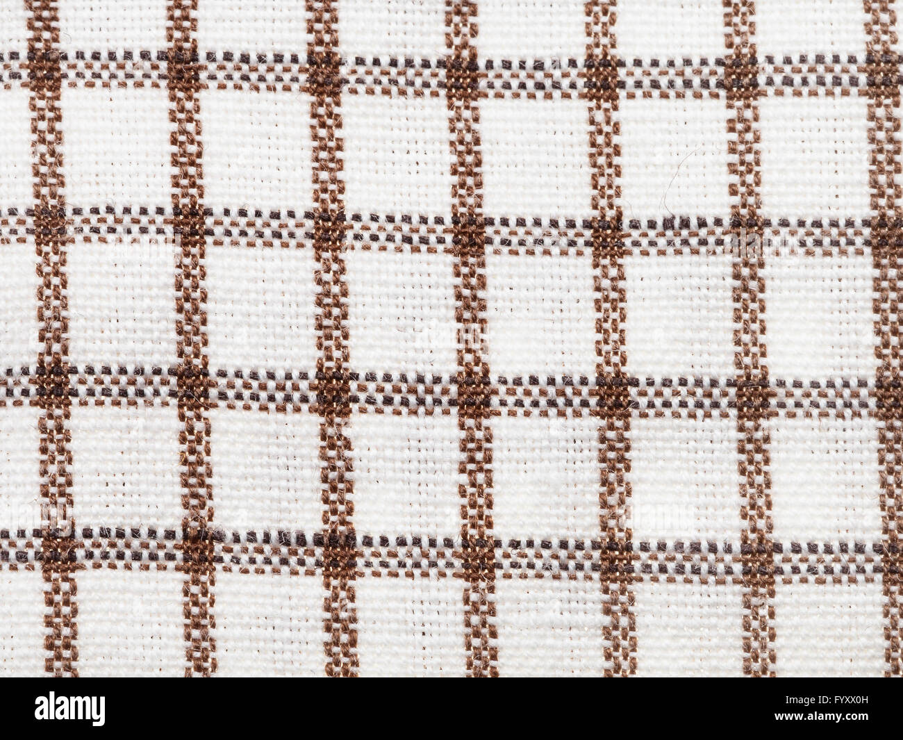 textile background - brown checkered cotton fabric with Calico weave ...
