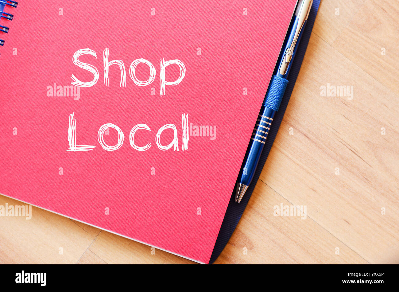 Shop local write on notebook Stock Photo - Alamy