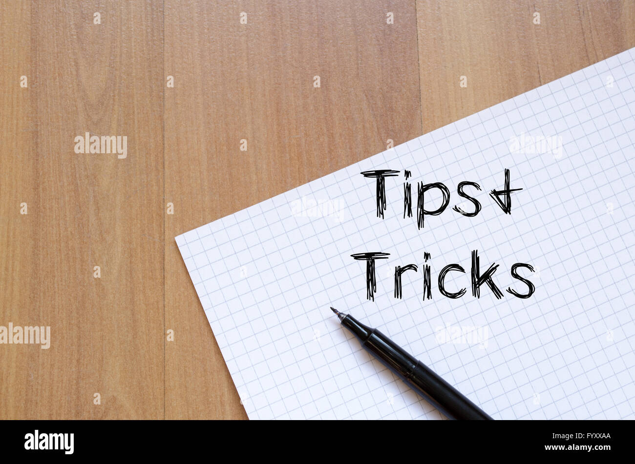 Tips and tricks write on notebook Stock Photo - Alamy