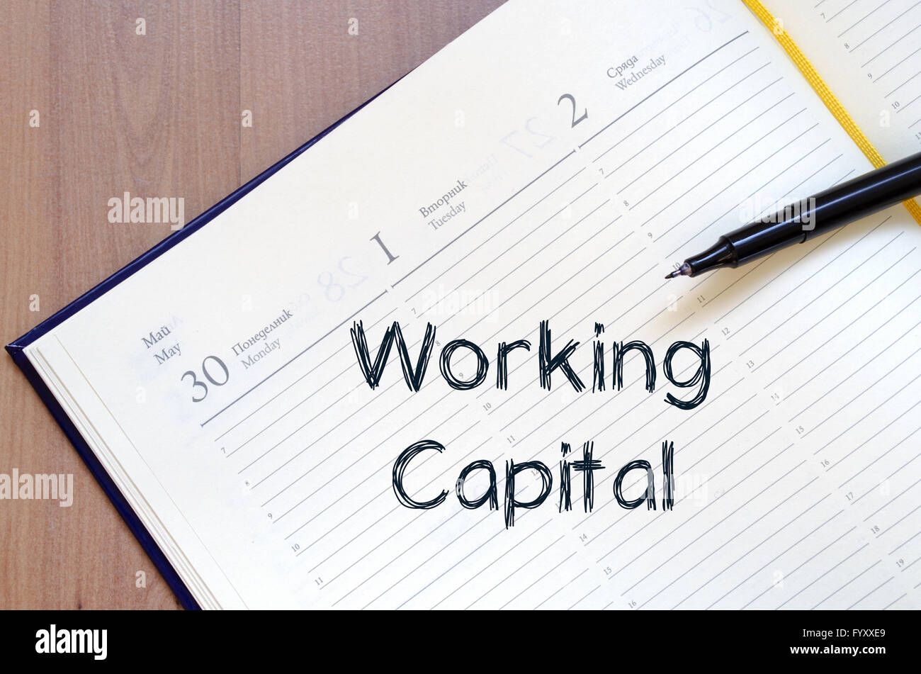 Working capital write on notebook Stock Photo - Alamy