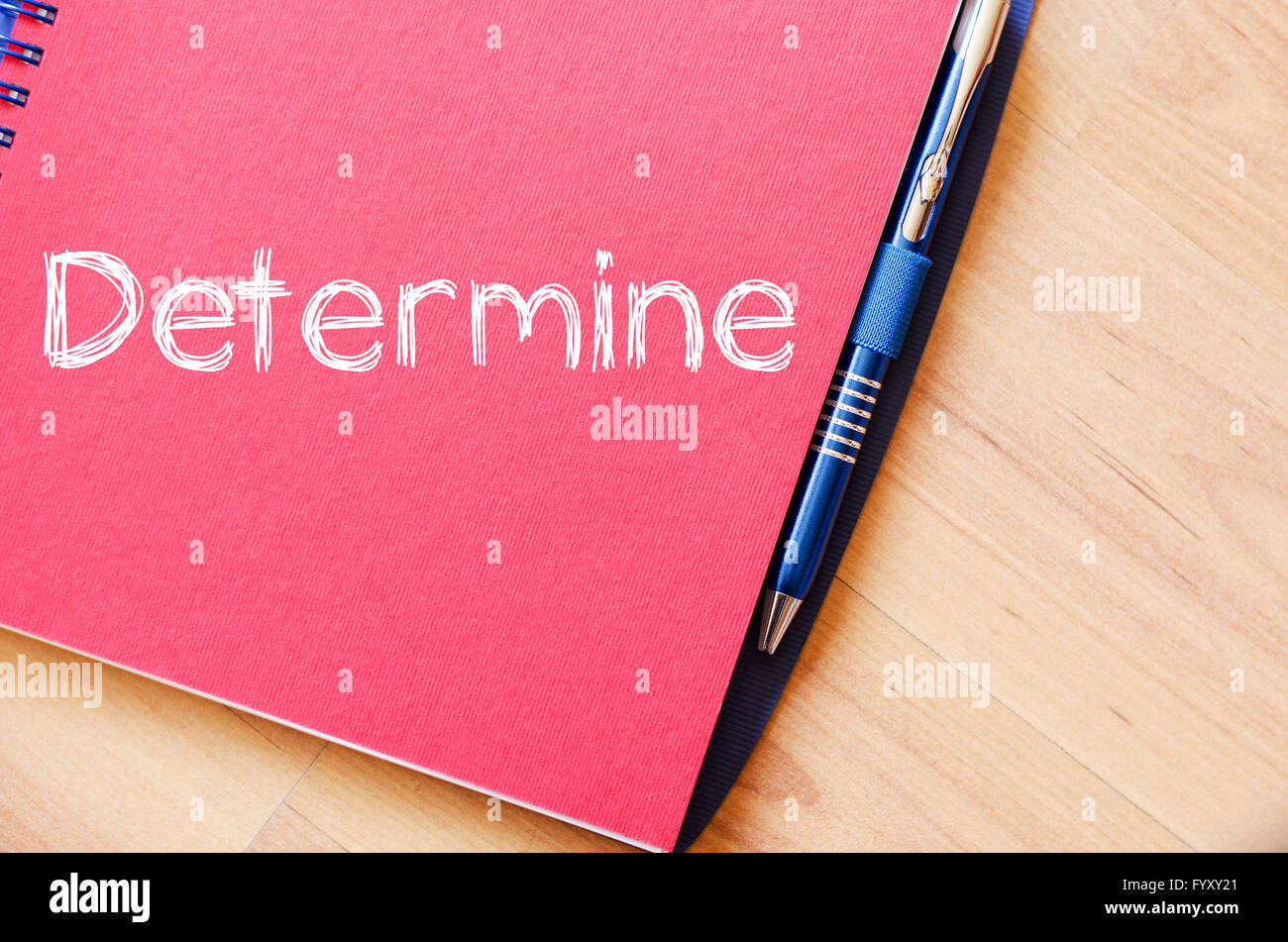 Determine write on notebook Stock Photo - Alamy