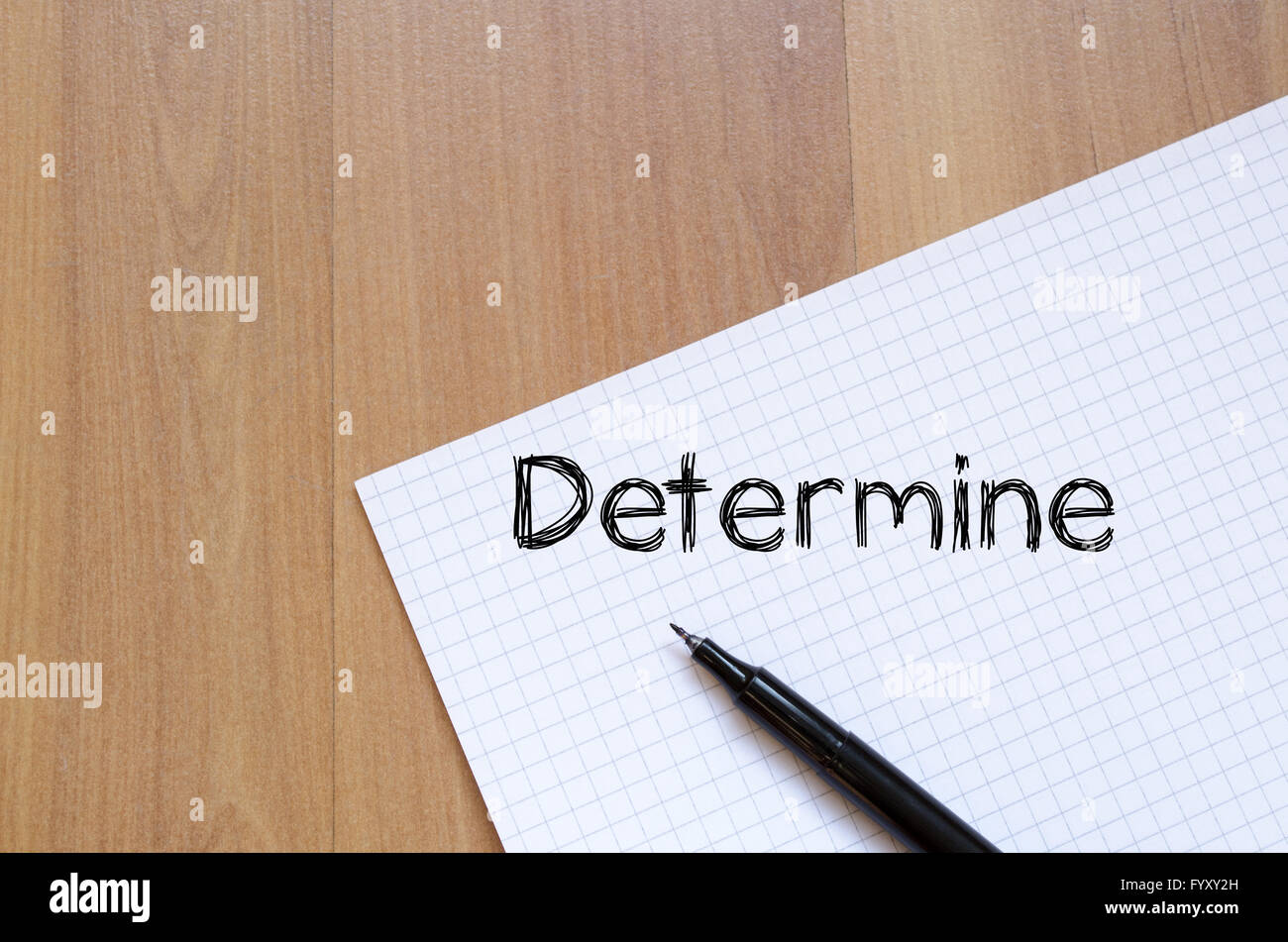 Determine write on notebook Stock Photo - Alamy