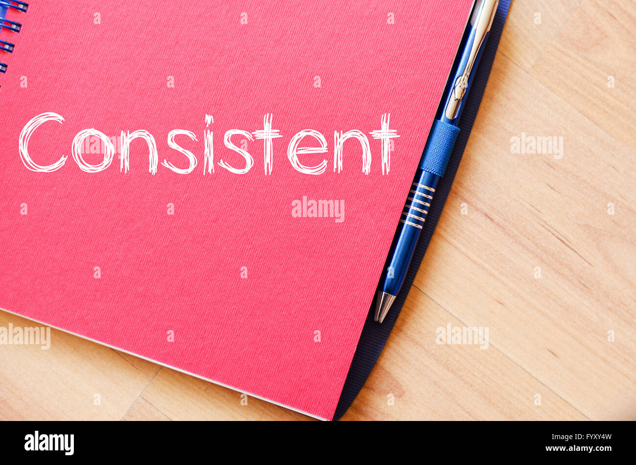 Consistent write on notebook Stock Photo - Alamy
