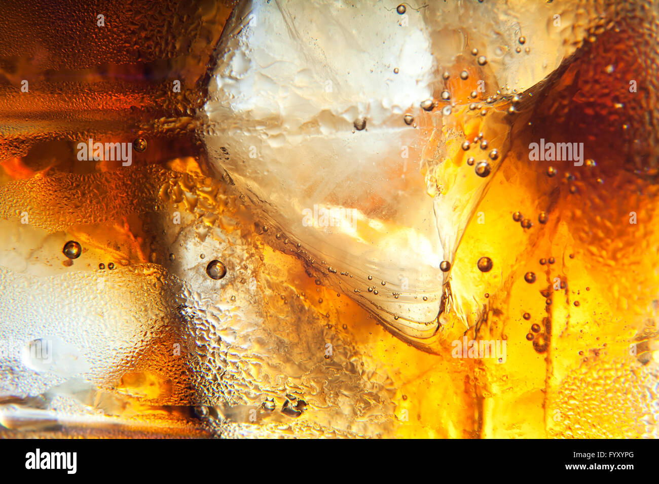 A fresh glass of cola with ice Stock Photo - Alamy
